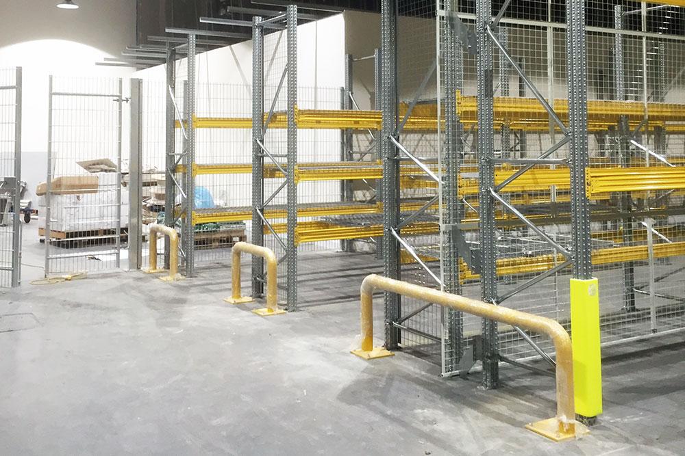 Warehouse Racking with Mesh and Barrier Protection | OfficeSTOR