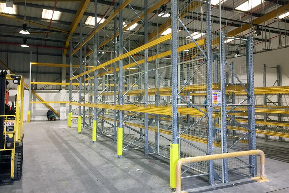 Warehouse Racking with Mesh and Barrier Protection | OfficeSTOR