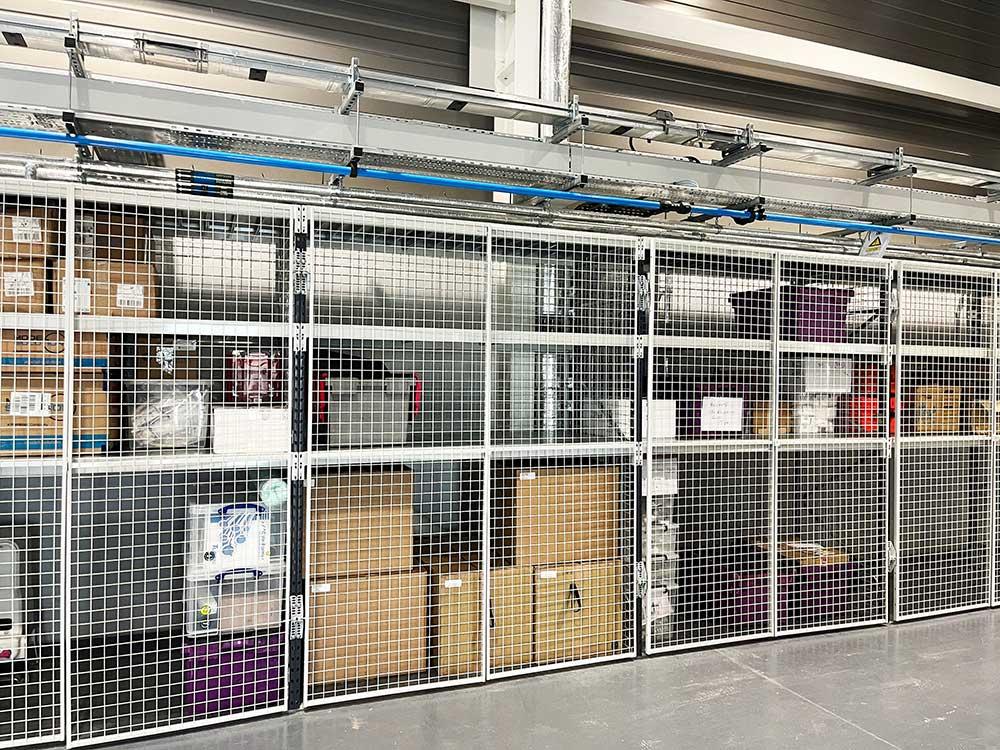 Design and Service Company uses longspan shelving with lockable doors ...