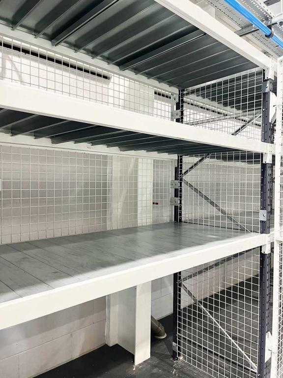 Design and Service Company uses longspan shelving with lockable doors ...