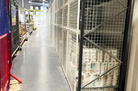 Design and Service Company uses longspan shelving with lockable doors ...